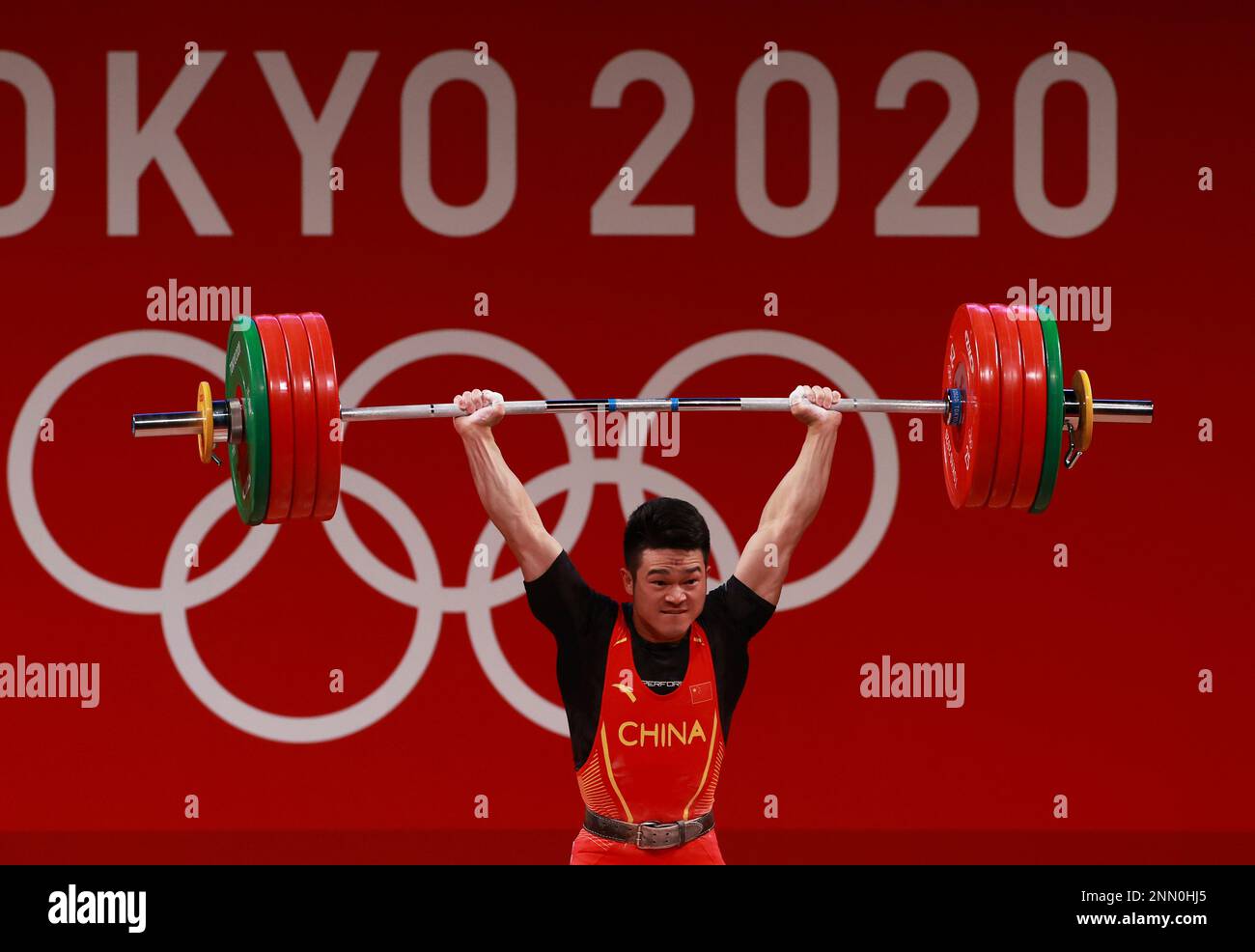 China's SHI Zhiyong competes in Weightlifting Men's 73kg of Tokyo 2020 ... China's SHI Zhiyong competes in Weightlifting Men's 73kg of Tokyo 2020 ...