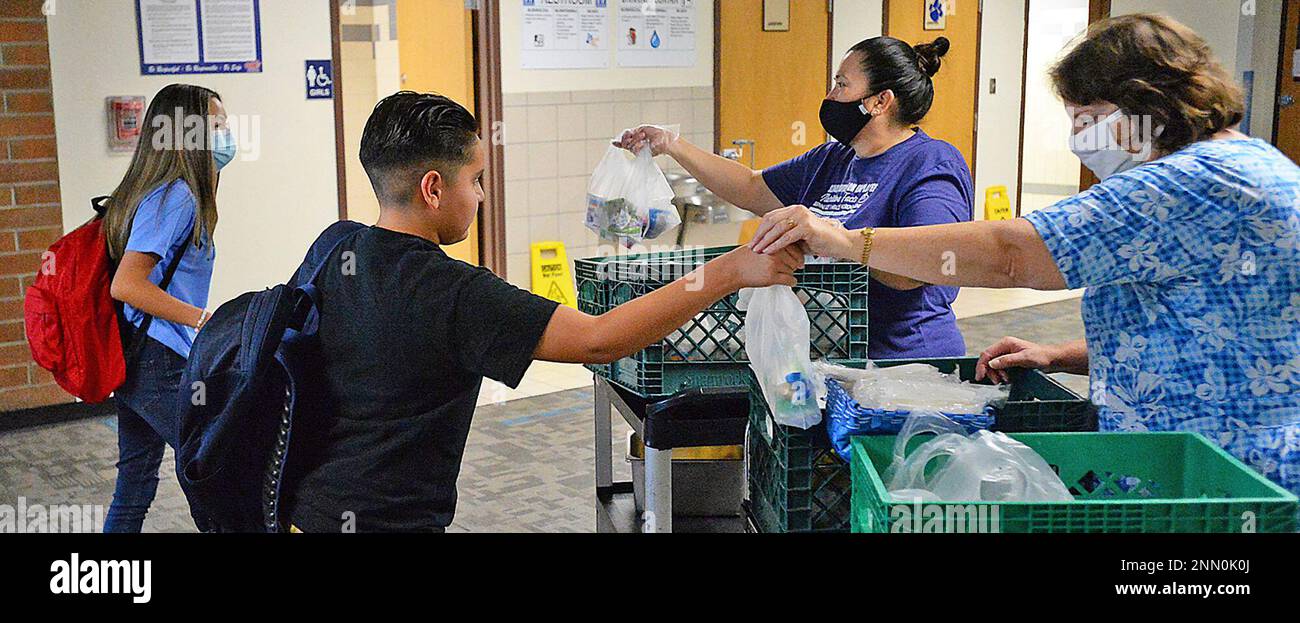 Crane Middle School cafeteria workers Alice Peach, right, and Lucy ...