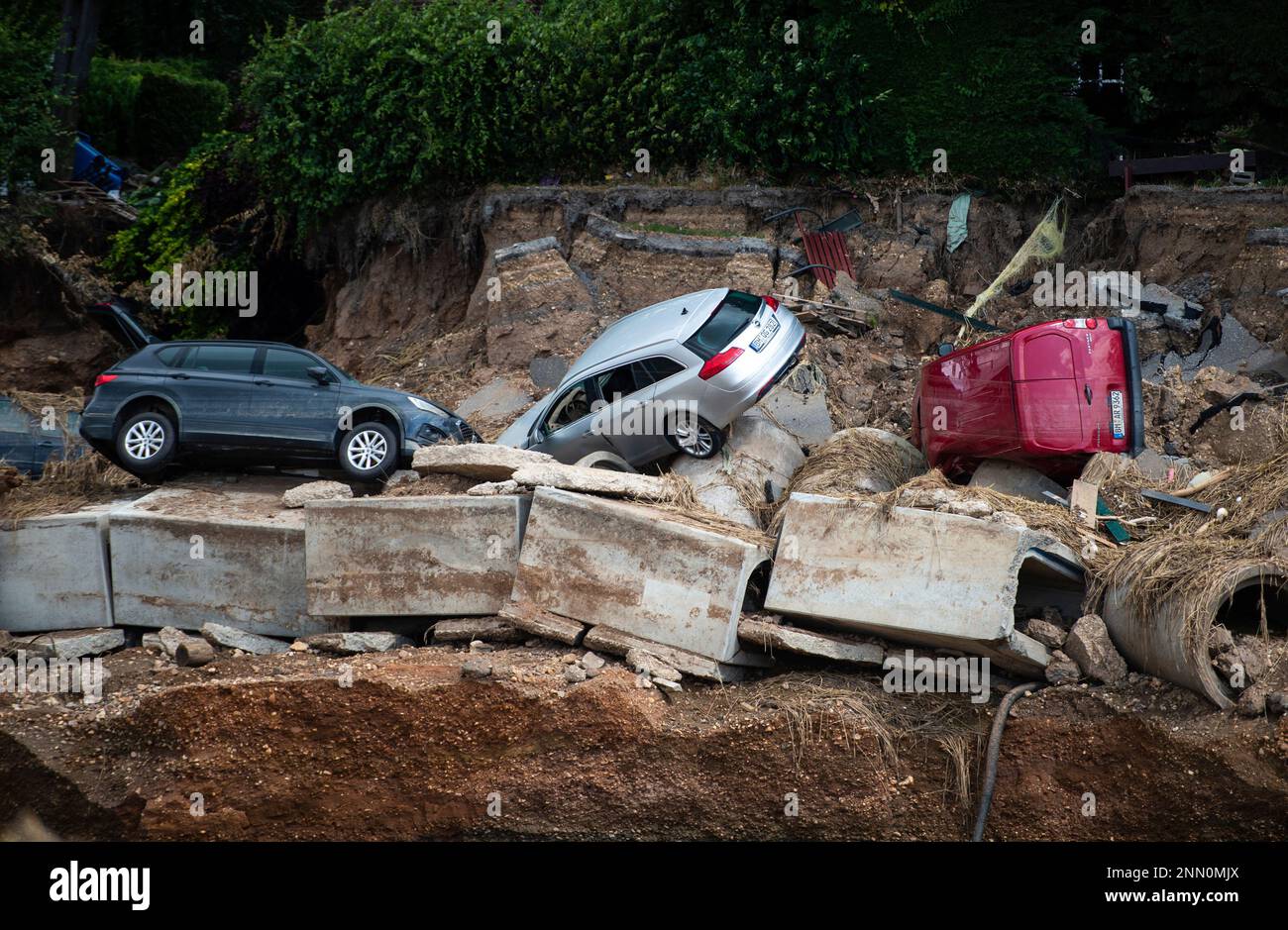 Cars lie in a washed out area in Erftstadt-Blessem, Wdnesday, July 28 ...