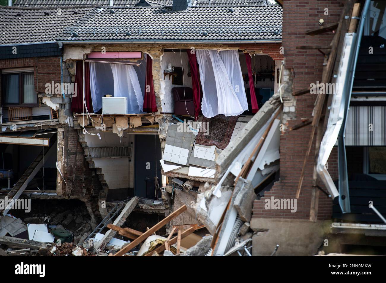 Houses have collapsed or are in danger of collapsing as a result of ...