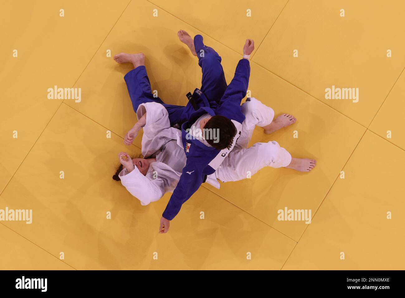 Austria's POLLERES Michaela (white) and Japan's ARAI Chizuru compete in ...