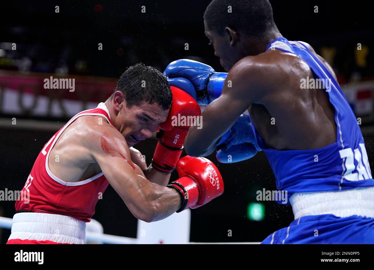 Colombia's Ceiber David Avila Segura, in red, and Zambia's Everisto ...