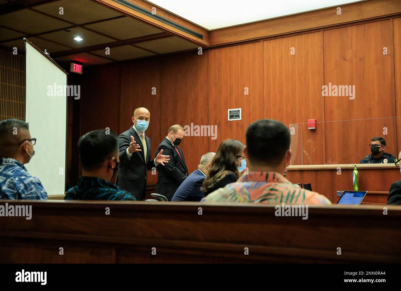 Defense attorney Thomas Otake, third from left, gestures while cross ...