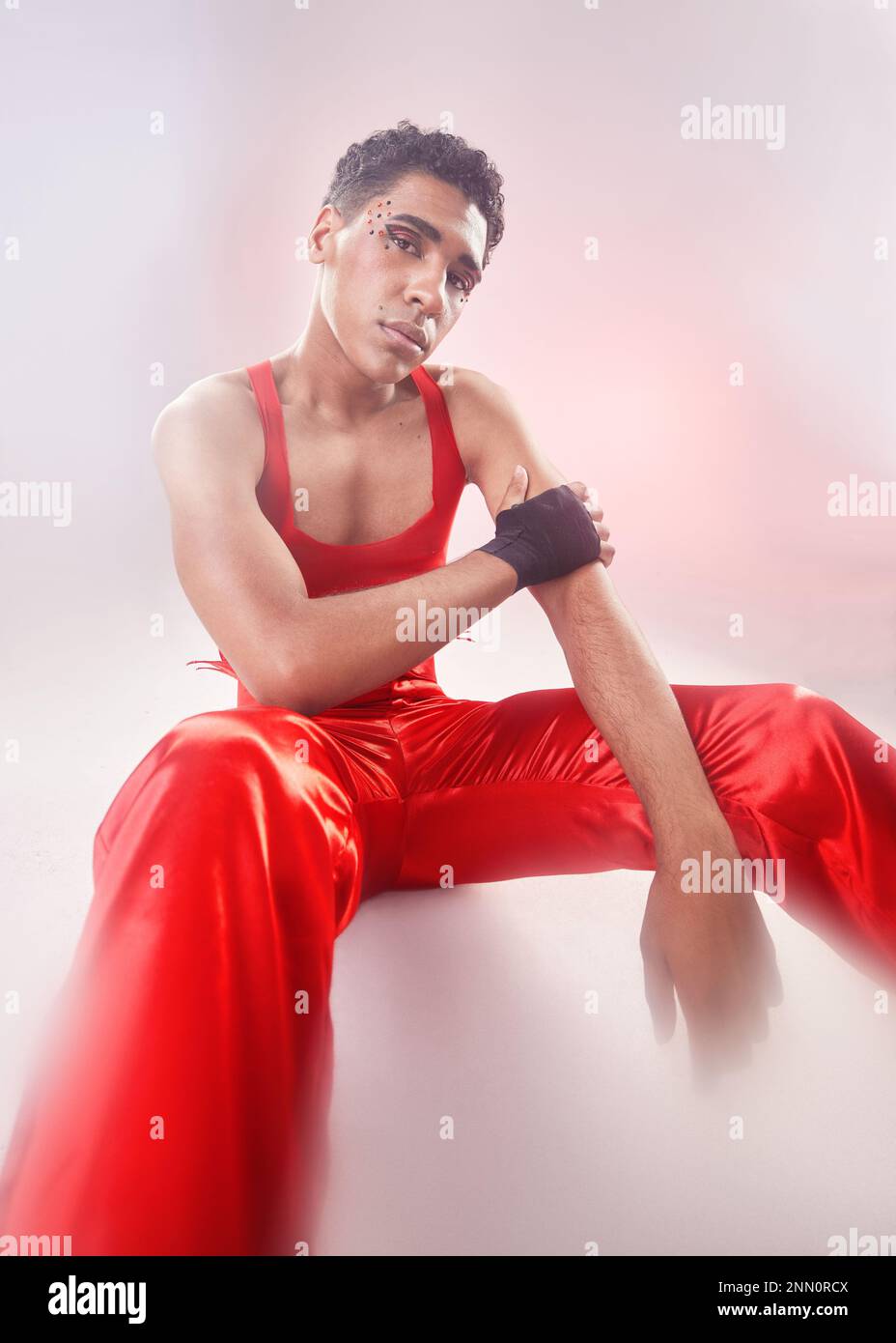 Fashion, retro and portrait of lgbt man or model with style posing as a ...