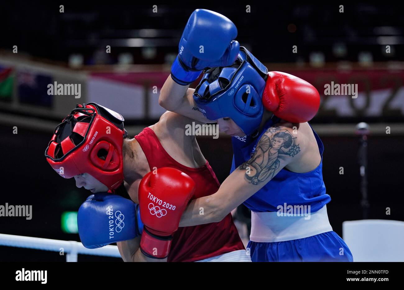 Canada's Caroline Veyre, left, and Italy's Irma Testa exchange punches ...