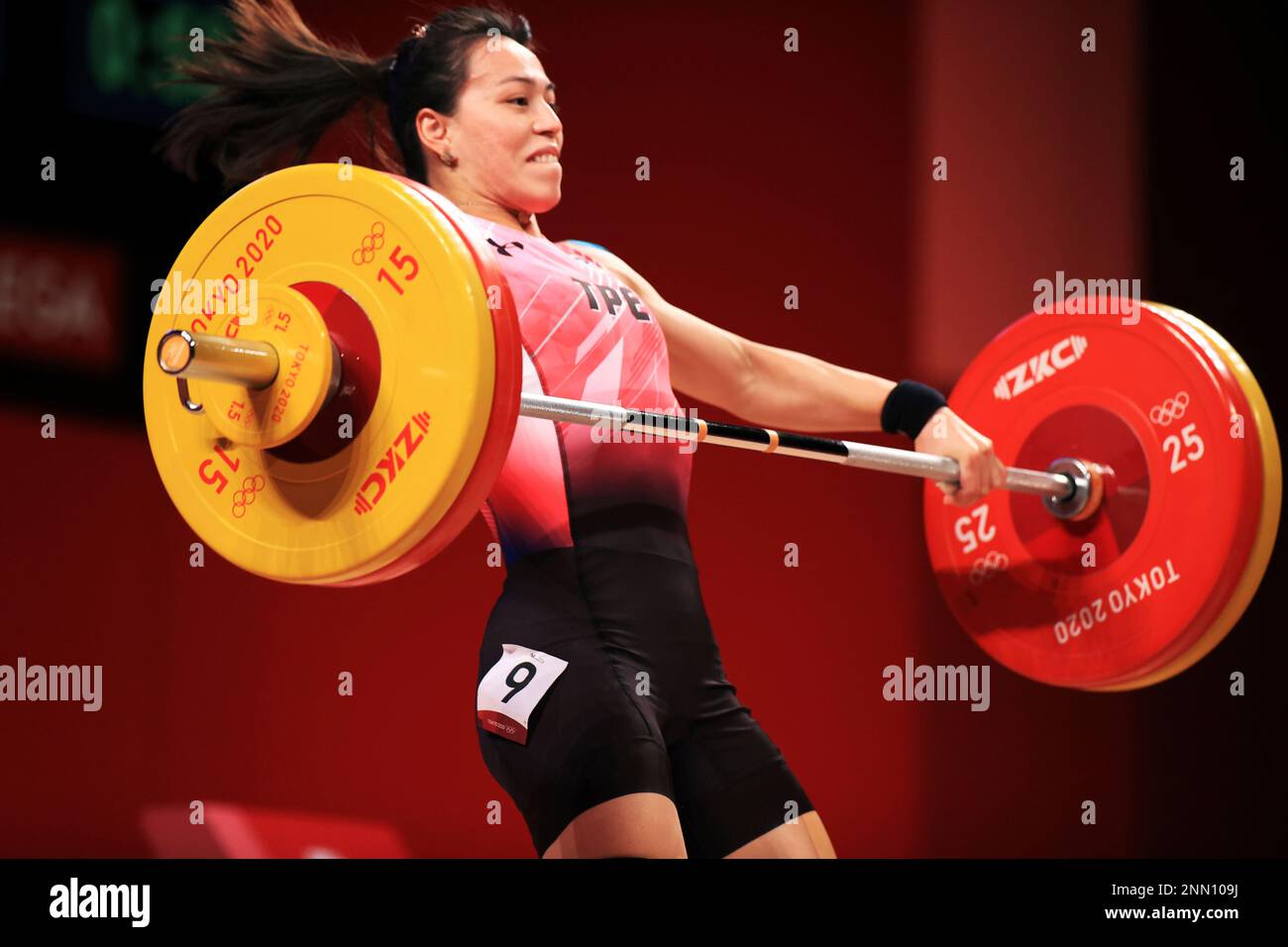 KUO Hsing-Chun of Chinese Taipei competes during weightlifting women's ...
