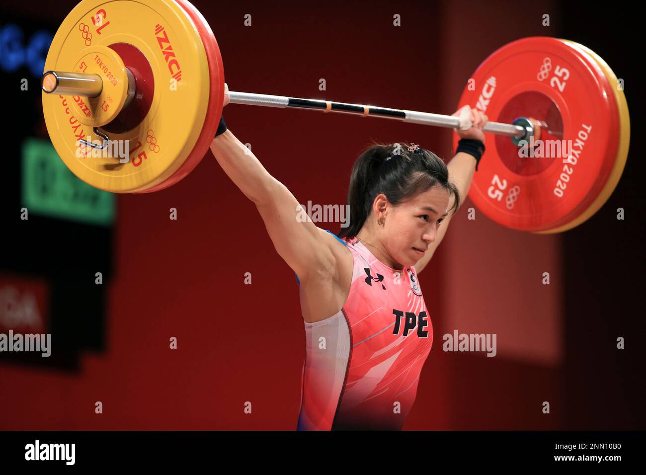 KUO Hsing-Chun of Chinese Taipei competes during weightlifting women's ...