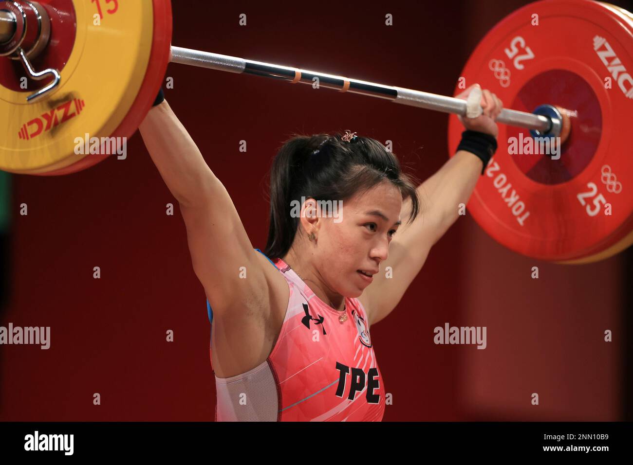 KUO Hsing-Chun of Chinese Taipei competes during weightlifting women's ...