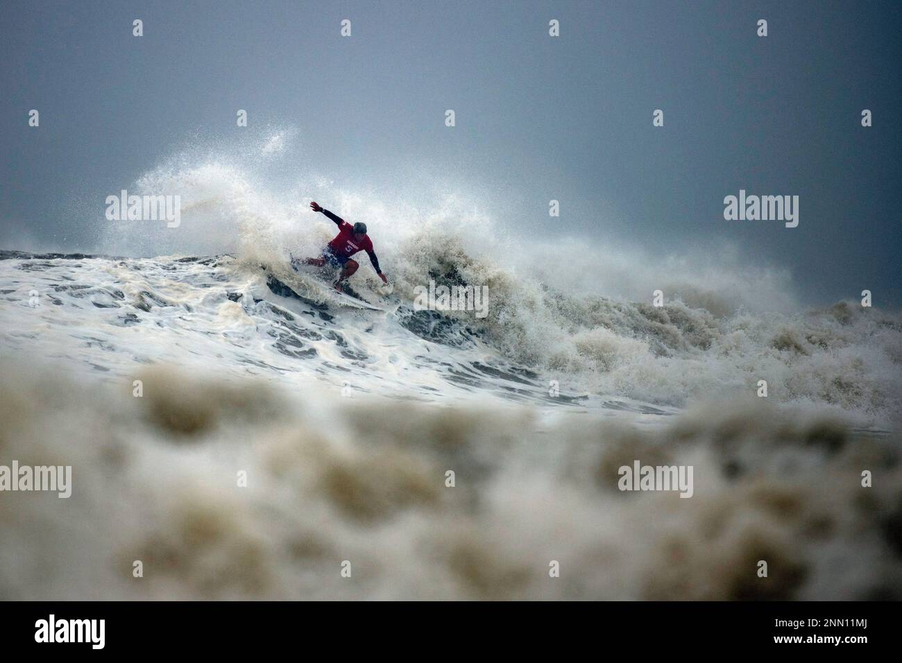 Japan's Kanoa Igarashi rides a wave during the quarterfinals of the men ...