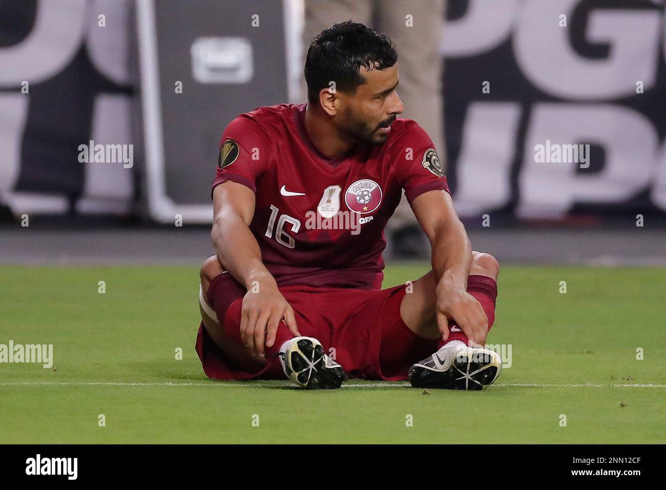 GLENDALE, AZ - JULY 24: Qatar defender Khoukhi Boualem (16) sits on the ...