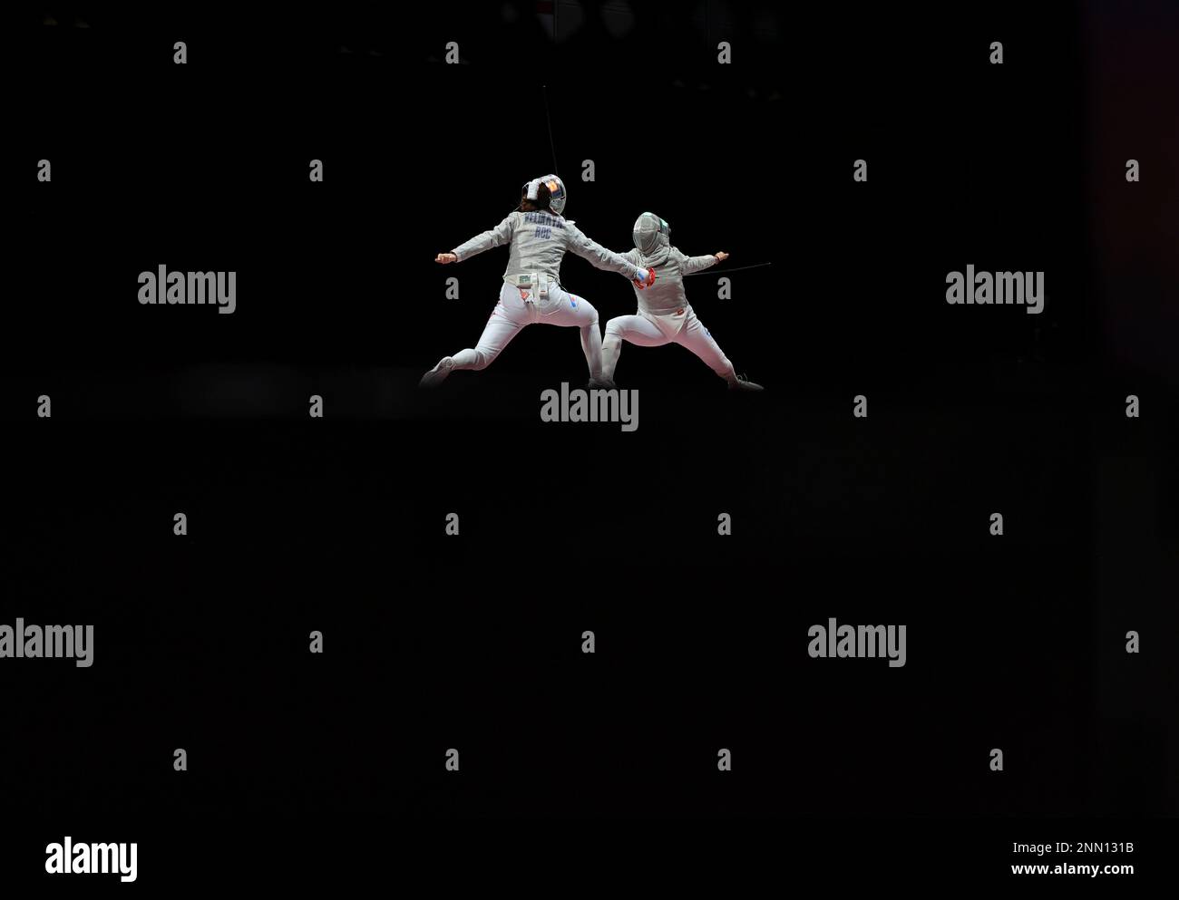 ROC's POZDNIAKOVA Sofia (R) and VELIKAYA Sofya compete during Fencing ...