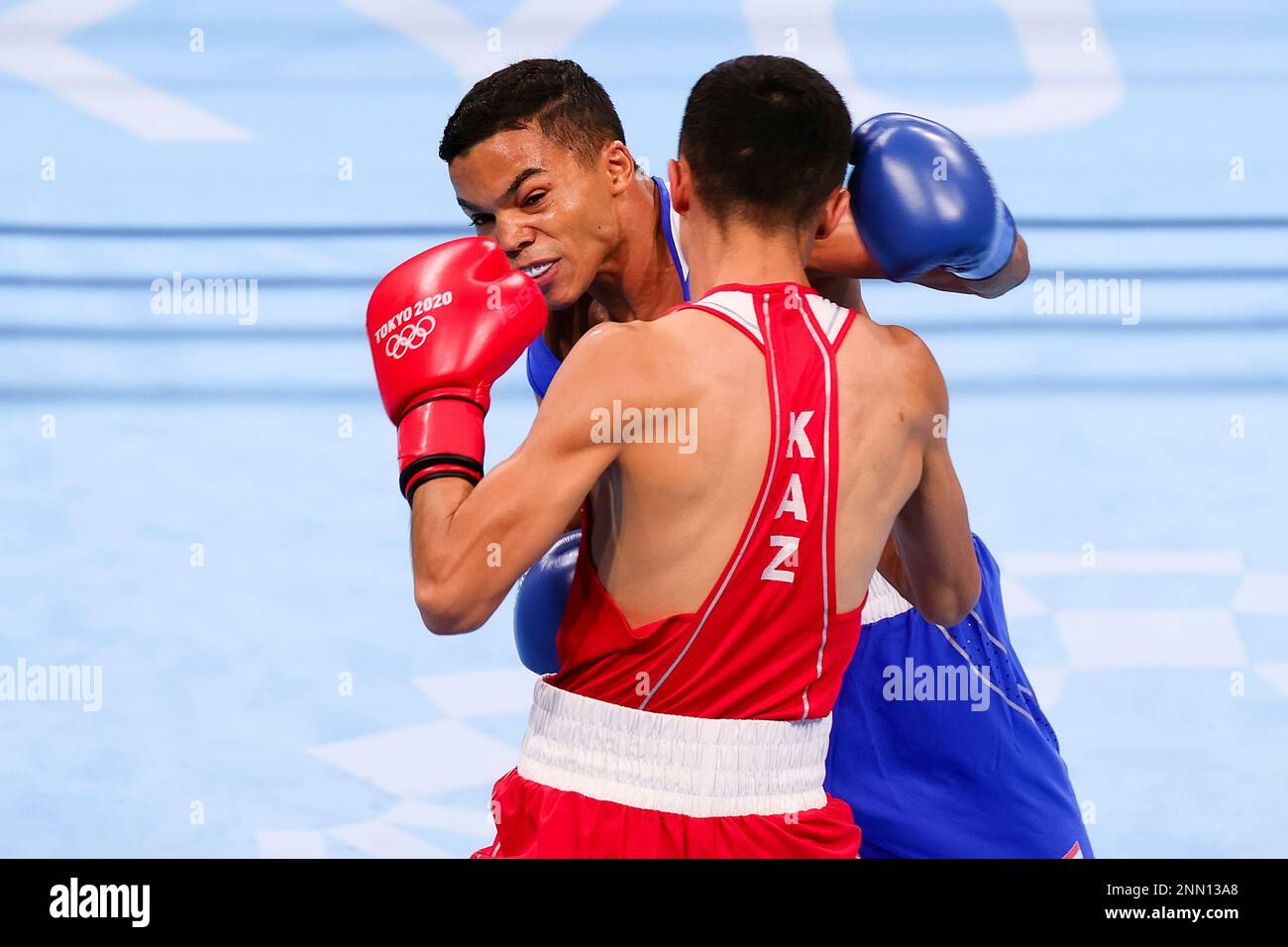 TOKYO, JAPAN - JULY 26: Saken Bibossinov of Kazakhstan throws a punch during the Men's Flyweight ...