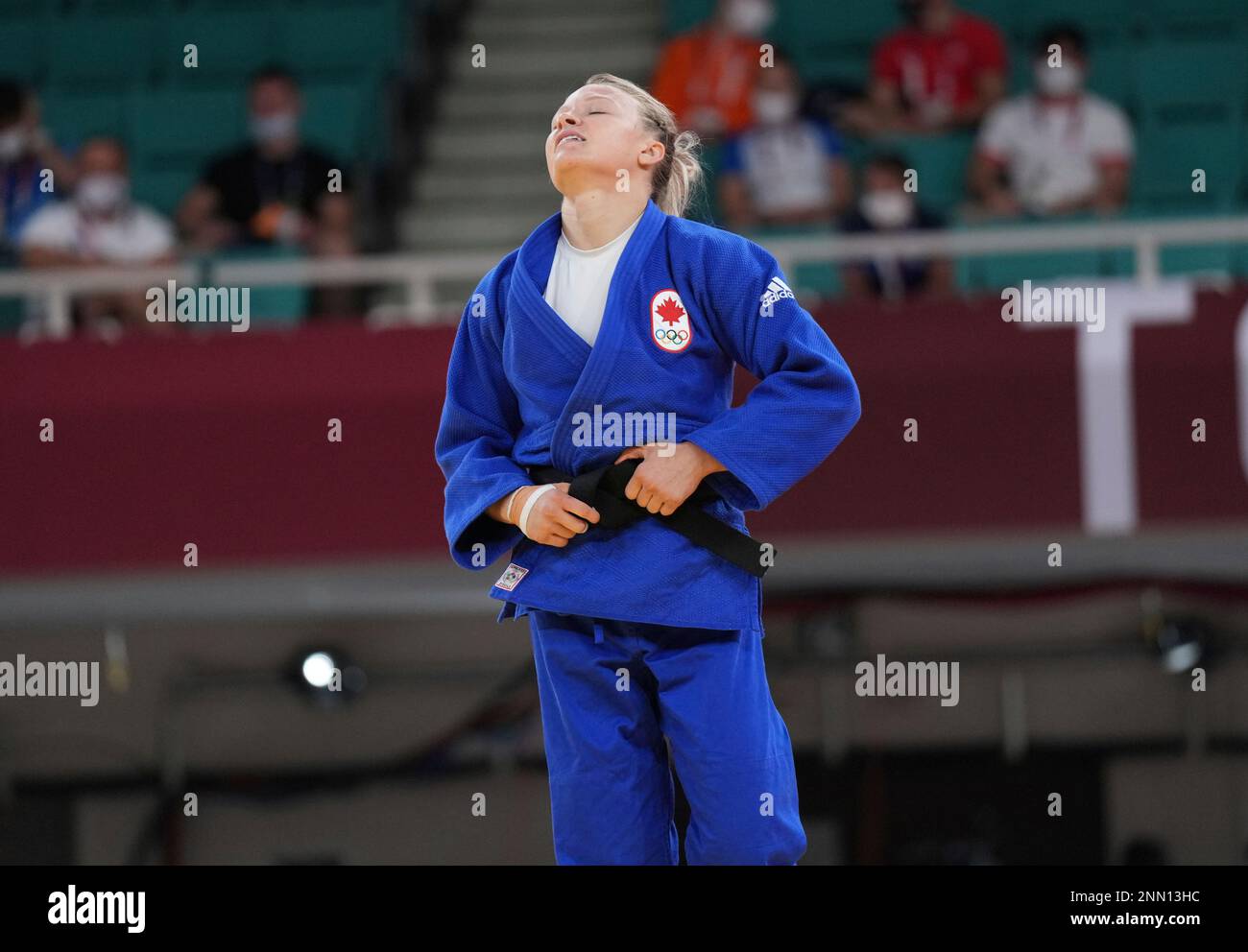 KLIMKAIT Jessica (R) of Canada becomes emotional after fighting against ...