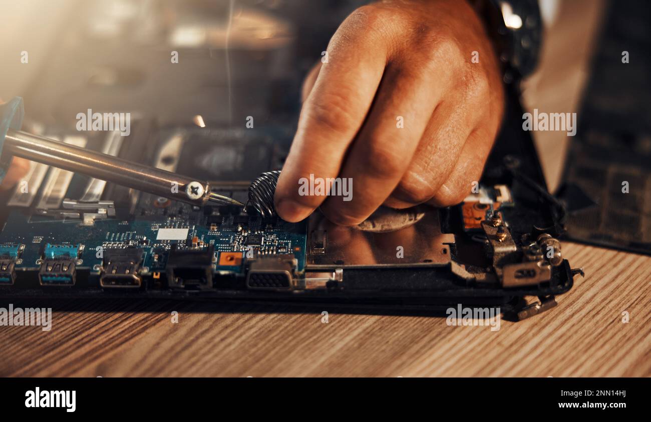 Information technology hands, circuit soldering and man repair ...