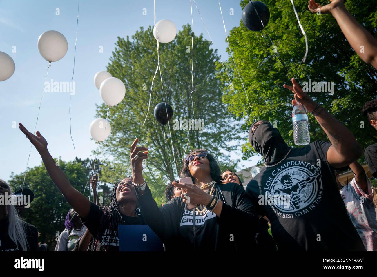Deborah Watts, Emmett Till's cousin, center, releases balloons with a ...