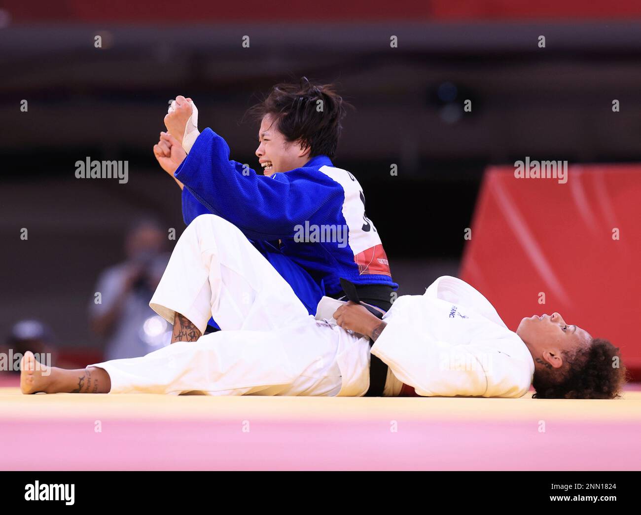 ABE Uta of Japan reacts after winning Judo women's -52kg final against ...