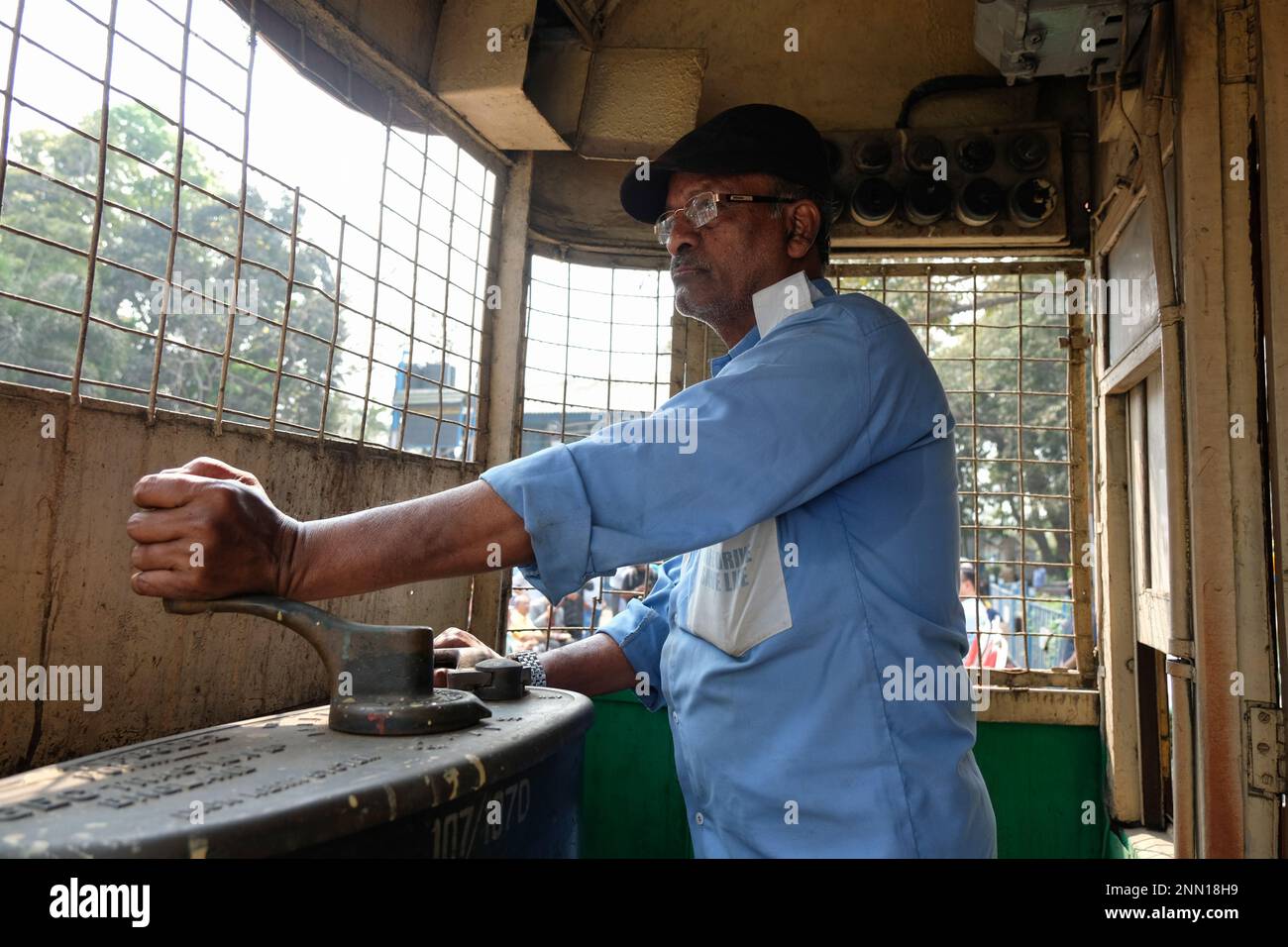 A tram driver is ready to start a decorated heritage tram in the ...