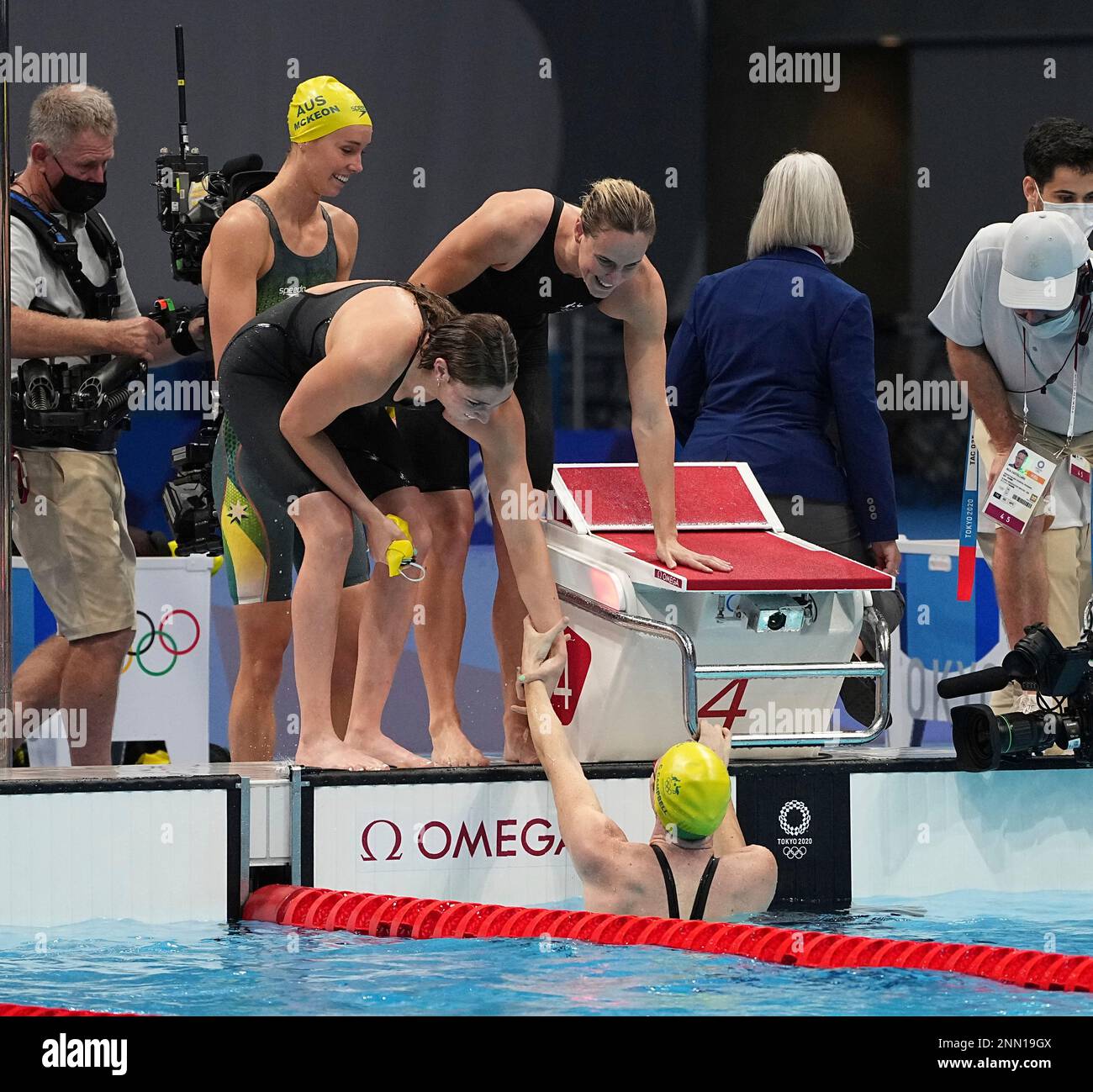 Australian team swimmers react after winning Women's 4 x 100m Freestyle ...