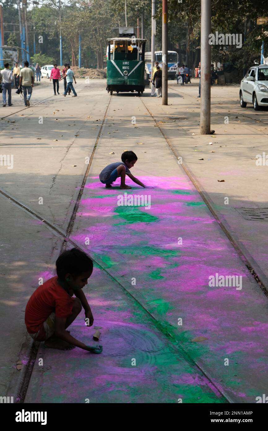 Children play in front of a heritage tram in the Esplanade tram depot ...