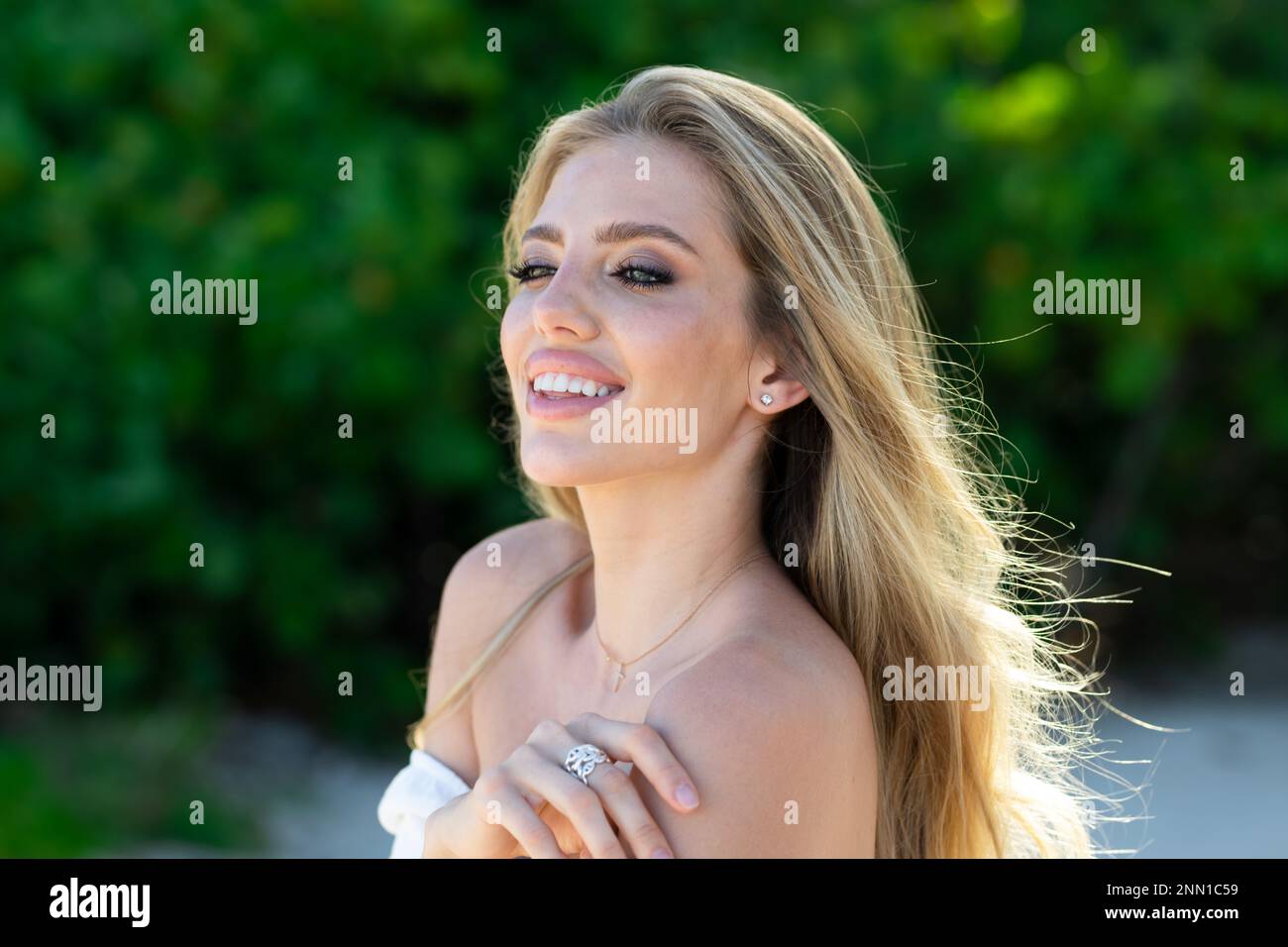 Beautiful young woman outdoor portrait. Summer model. Close-up beauty ...