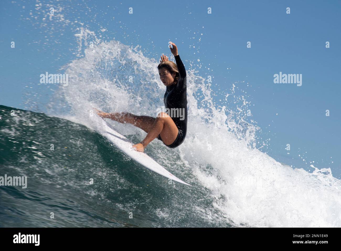 Japan's Mahina Maeda rides a wave during a training session at the 2020 ...