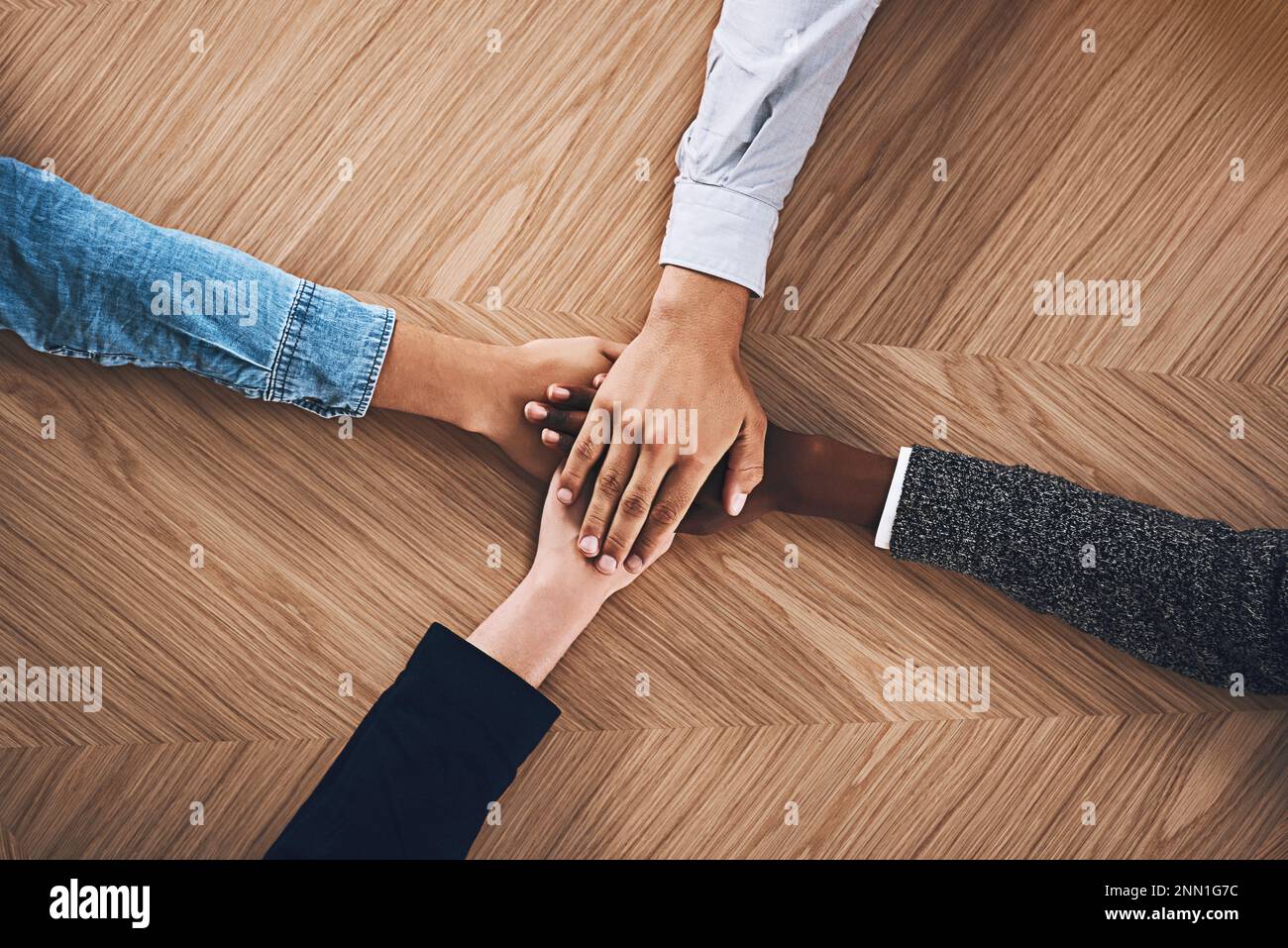 Its easier to achieve success together. High angle shot of a group of ...