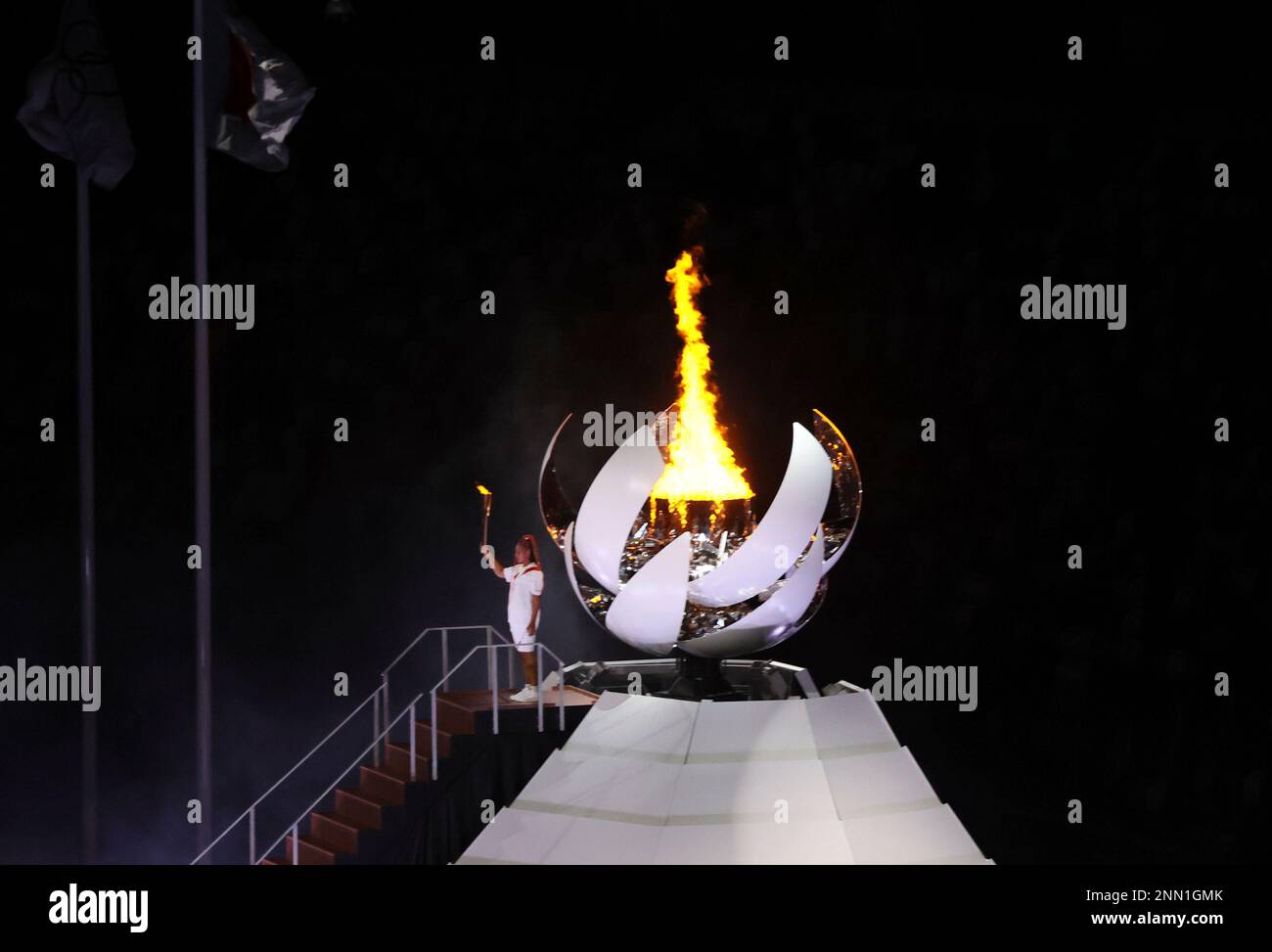 Naomi Osaka, Japanese tennis player, ignites the torch during the ...