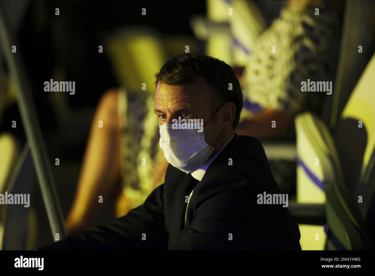 French President Emmanuel Macron watches the opening ceremony in the ...