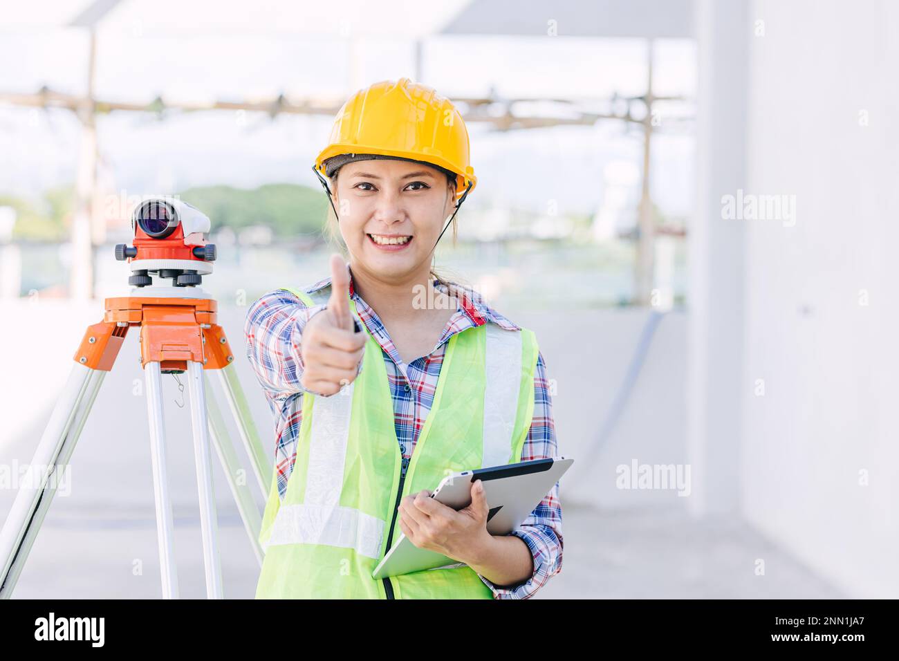 Asian woman engineer worker work in construction site. Smart builder ...