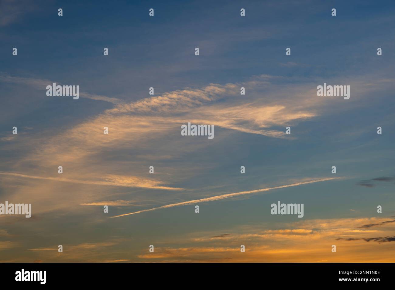 Clouds and contrails hi-res stock photography and images - Alamy