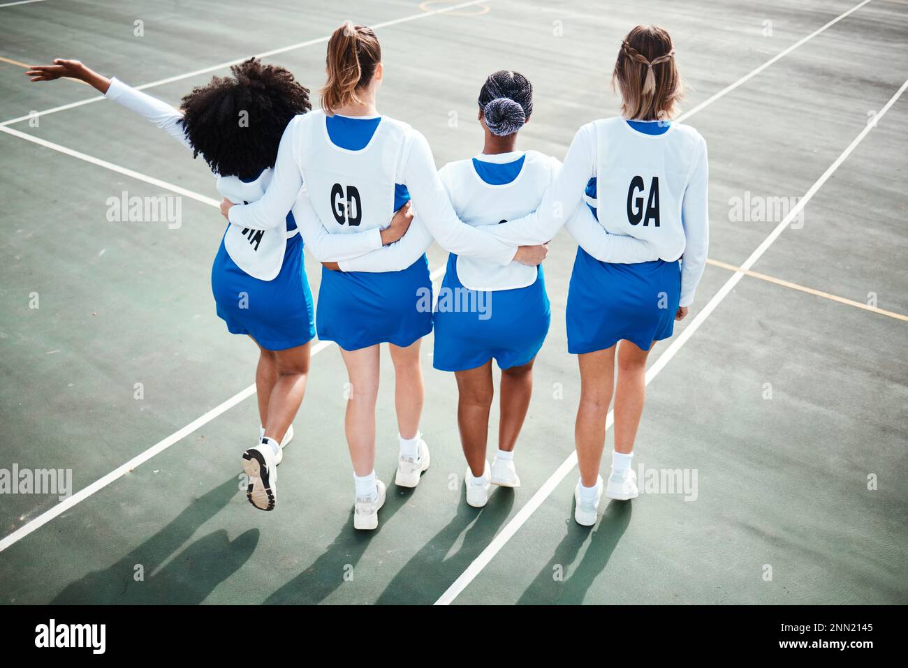 Netball team, sports on outdoor court and diversity, athlete group and ...