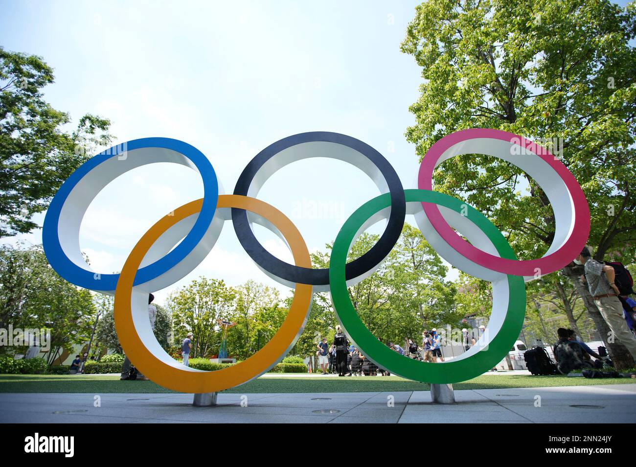 People pose with the Olympic Five-Ring Emblem at Japan Sport Olympic ...