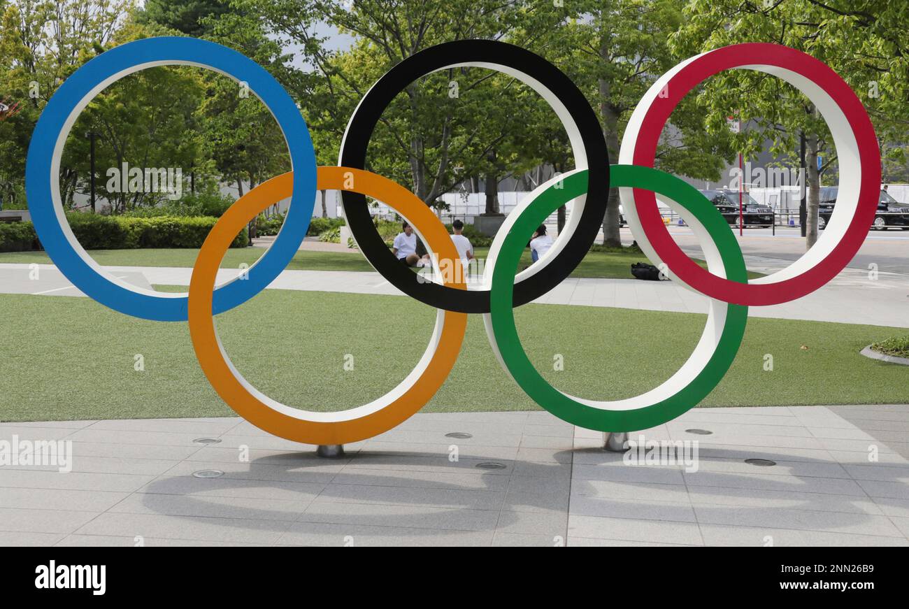 A photo shows a five-ring Olympic emblem in front of National Stadium ...