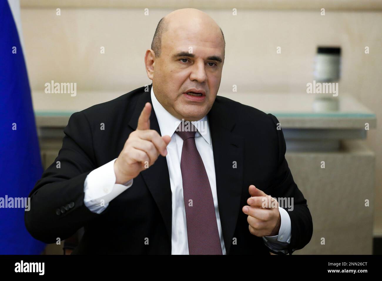 Russian Prime Minister Mikhail Mishustin gestures while speaking during ...