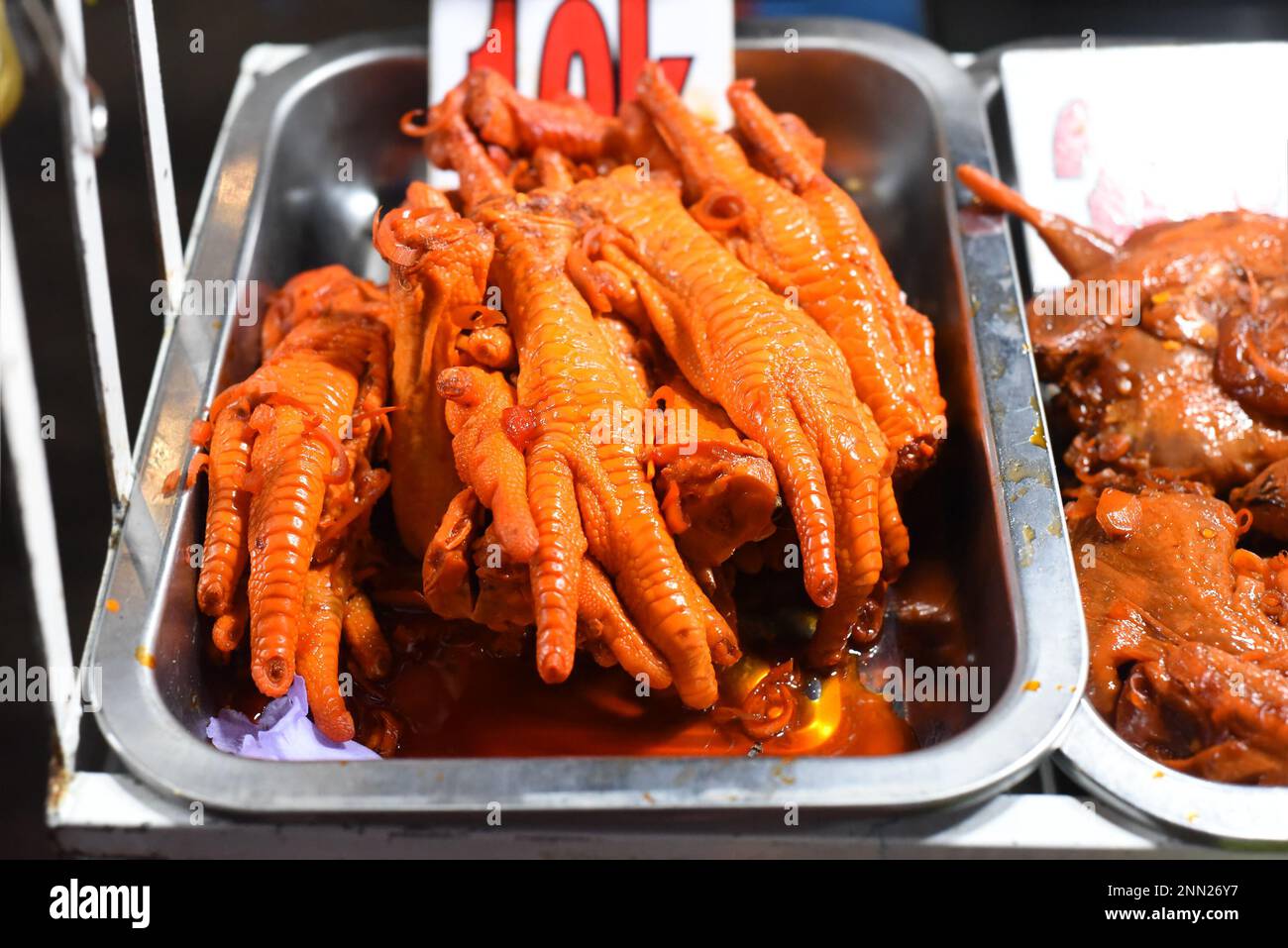 Vietnamese favorite snack braised chicken paw in chili sauce in ...