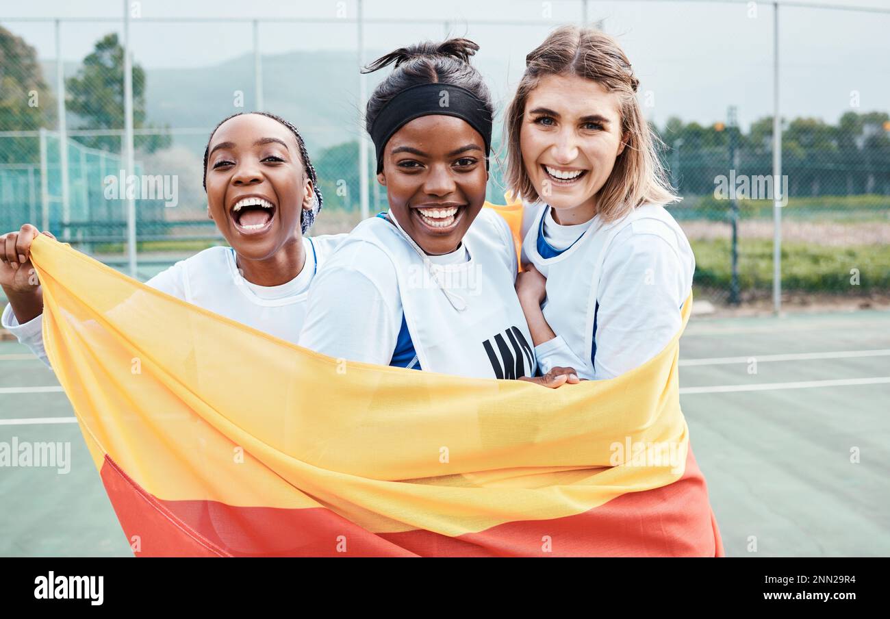 Winning netball, sports flag and team celebration, excited or celebrate ...