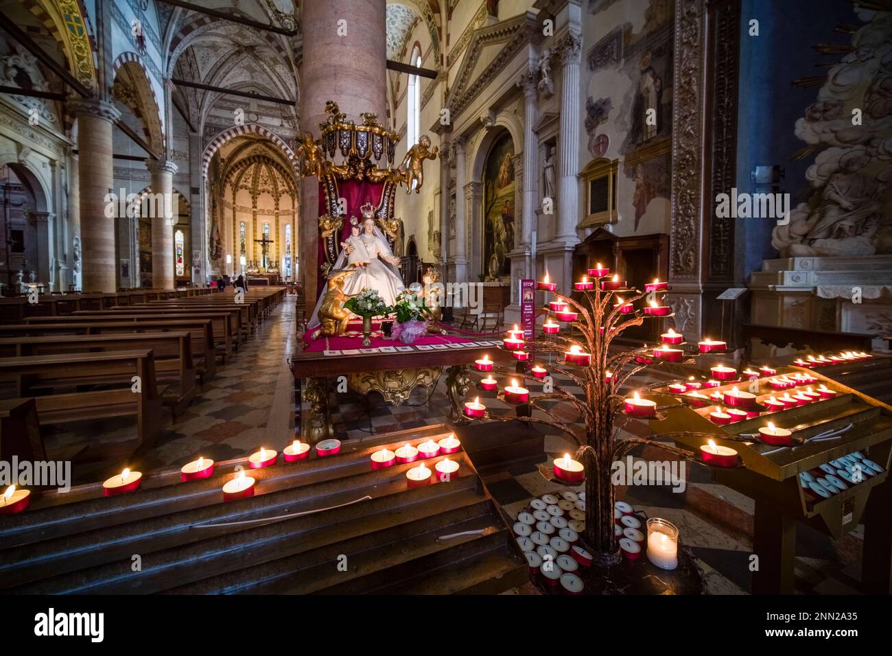 Altar, interior furnishings, a statue of the Virgin Mary and candles ...