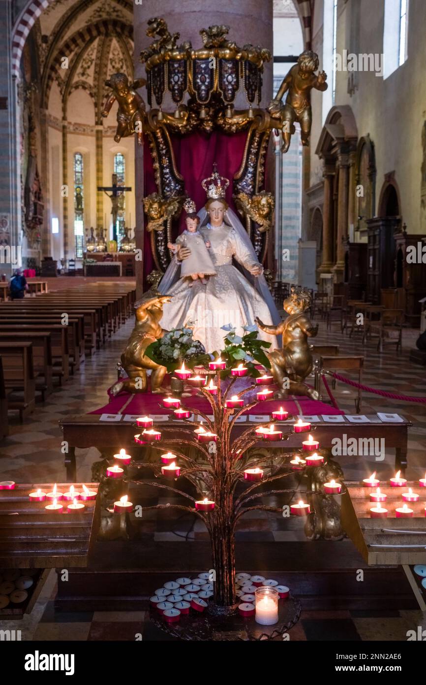 Altar, interior furnishings, a statue of the Virgin Mary and candles ...