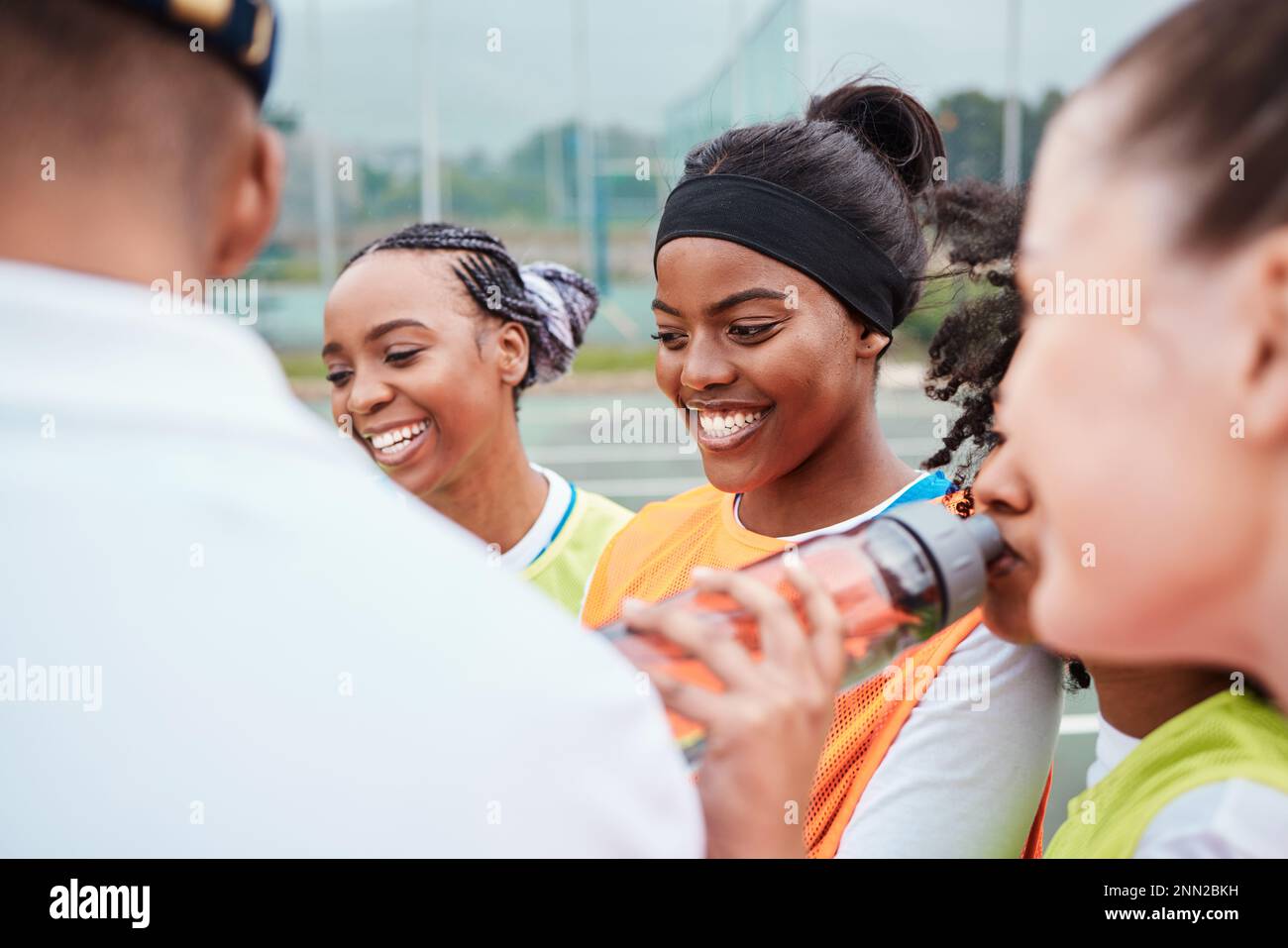 Sports plan, netball team and coach planning game strategy, teamwork ...
