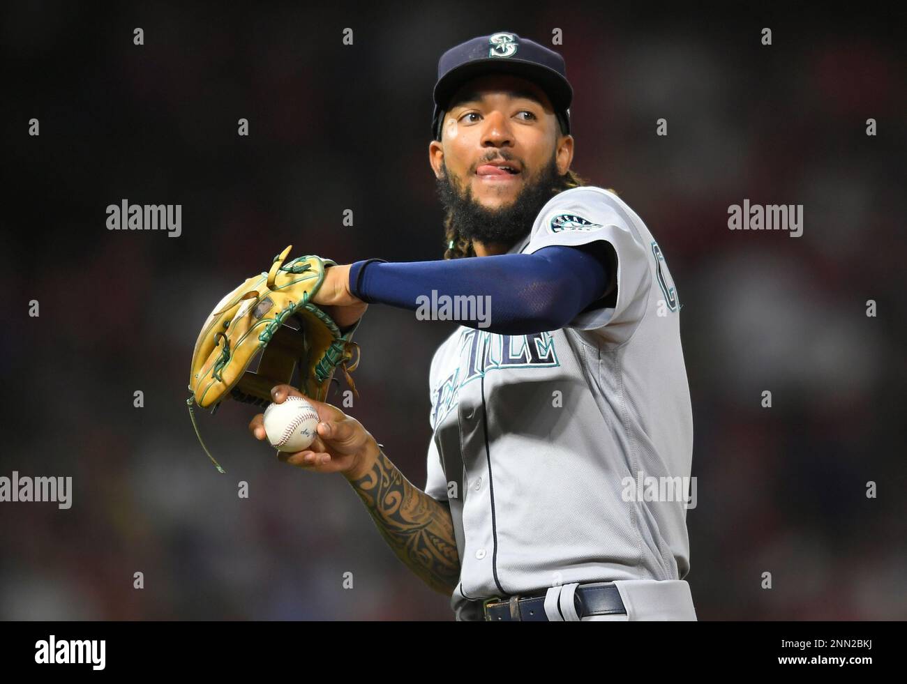 ANAHEIM, CA - JULY 16: Shed Long Jr. (4) of the Seattle Mariners throws ...