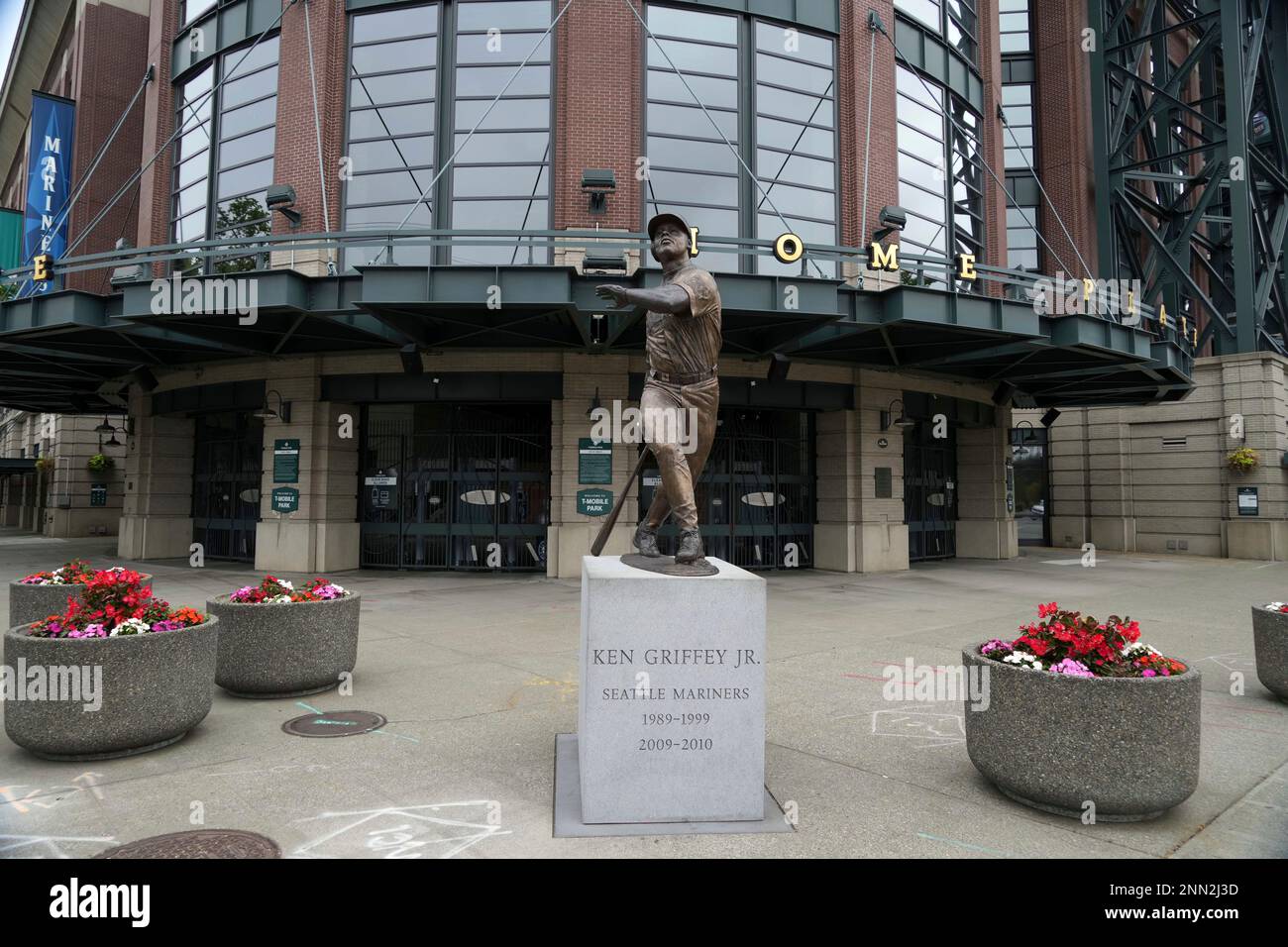 A statue of Ken Griffey Jr. at the home plate entrance of T-Mobile Park ...