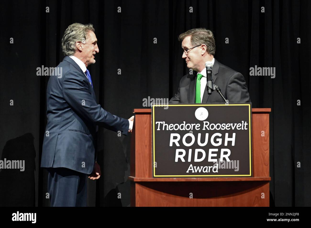 July 14, 2021: North Dakota Governor Doug Burgum (left) greets ...