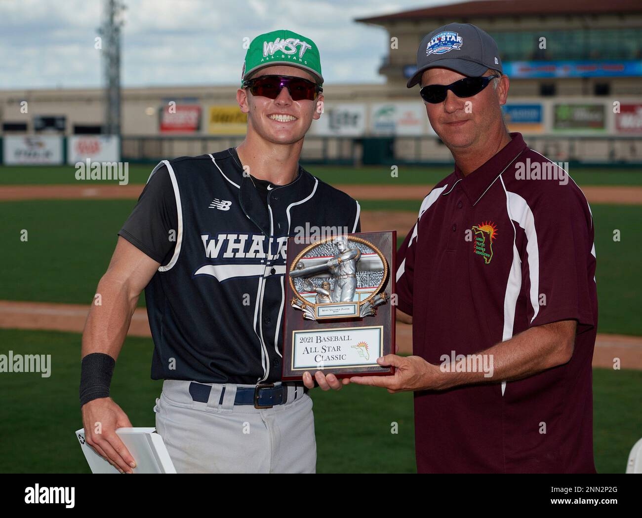 Wharton Wildcats infielder Zach Ehrhard (14) receives the Most Valuable ...