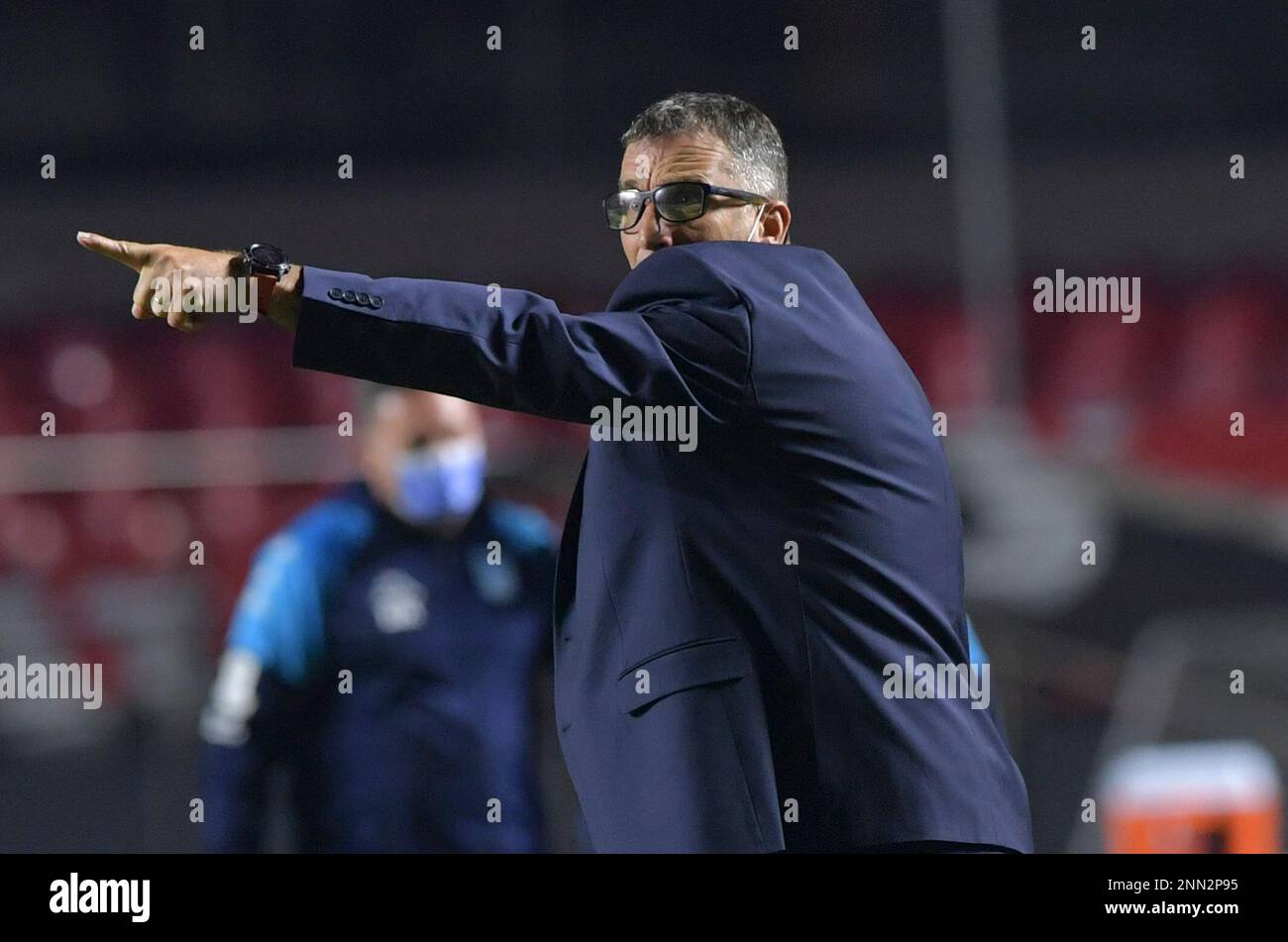 Coach Juan Antonio Pizzi of Argentina's Racing Club gives instructions ...