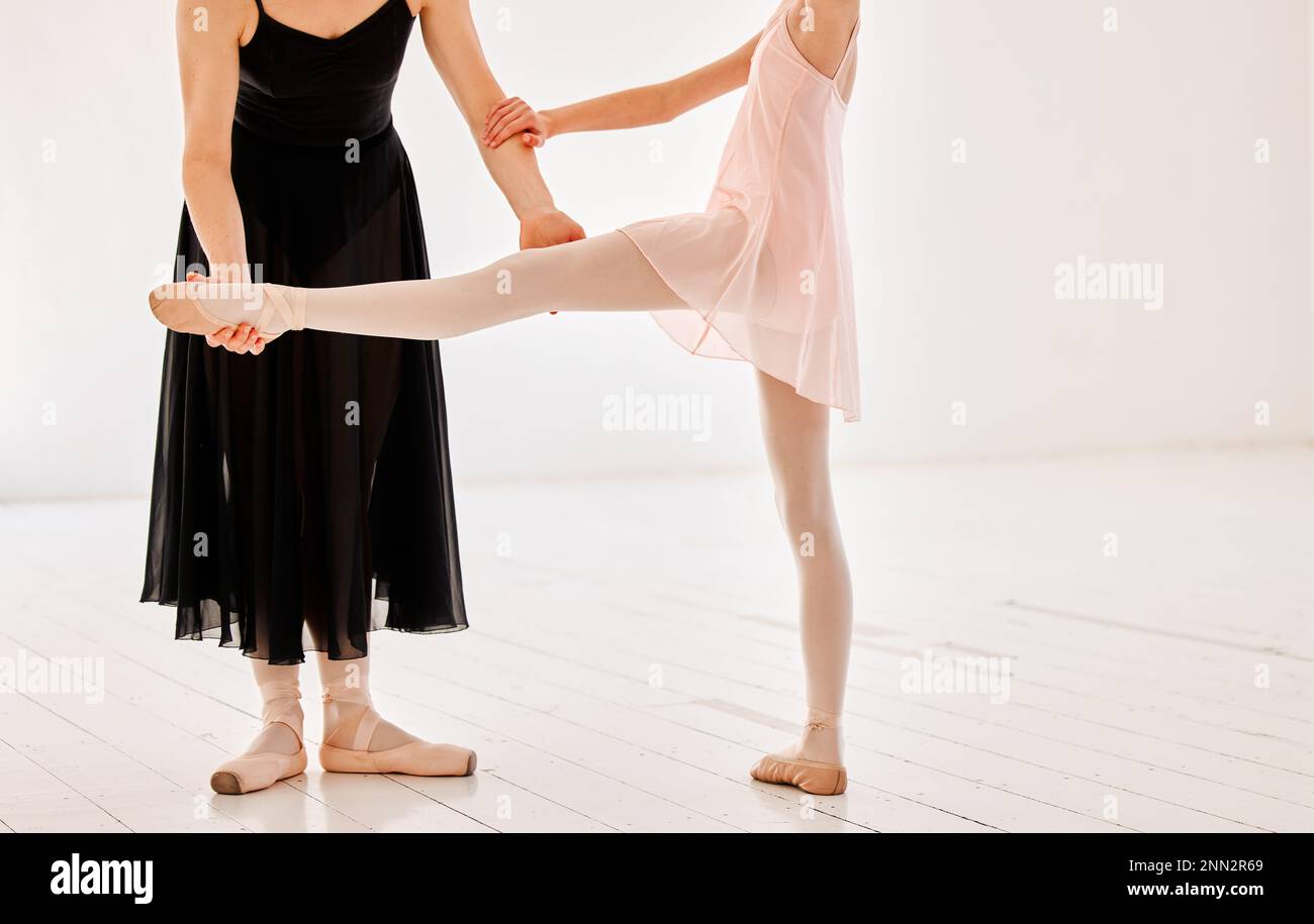Closeup, ballet and mentor with girl, balance and practice for ...