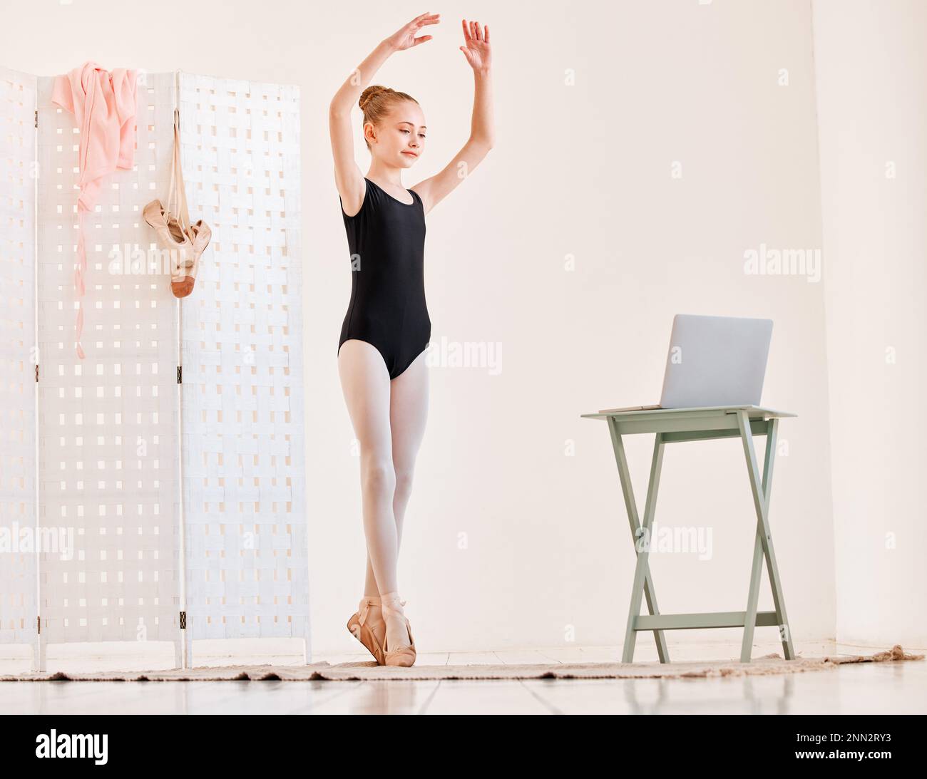 Ballet, child and laptop for online learning while dancing, happy and ...