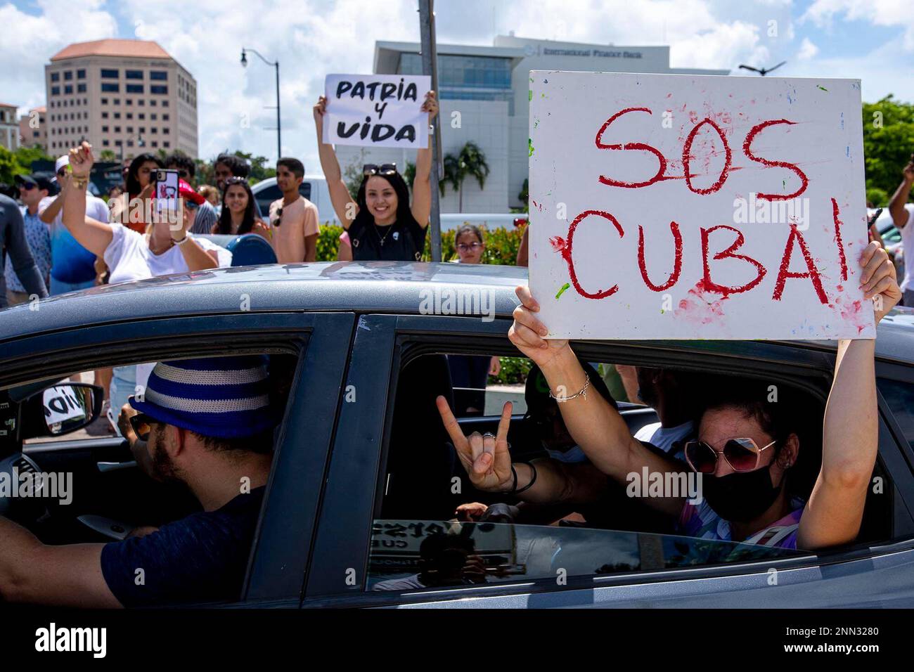 People protest during a demonstration in solidarity with thousands of ...