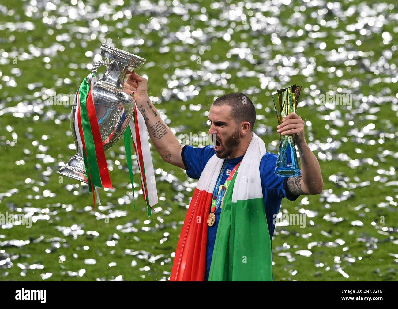 Italy's Giorgio Chiellini lifts the trophy after winning the Euro 2020 ...