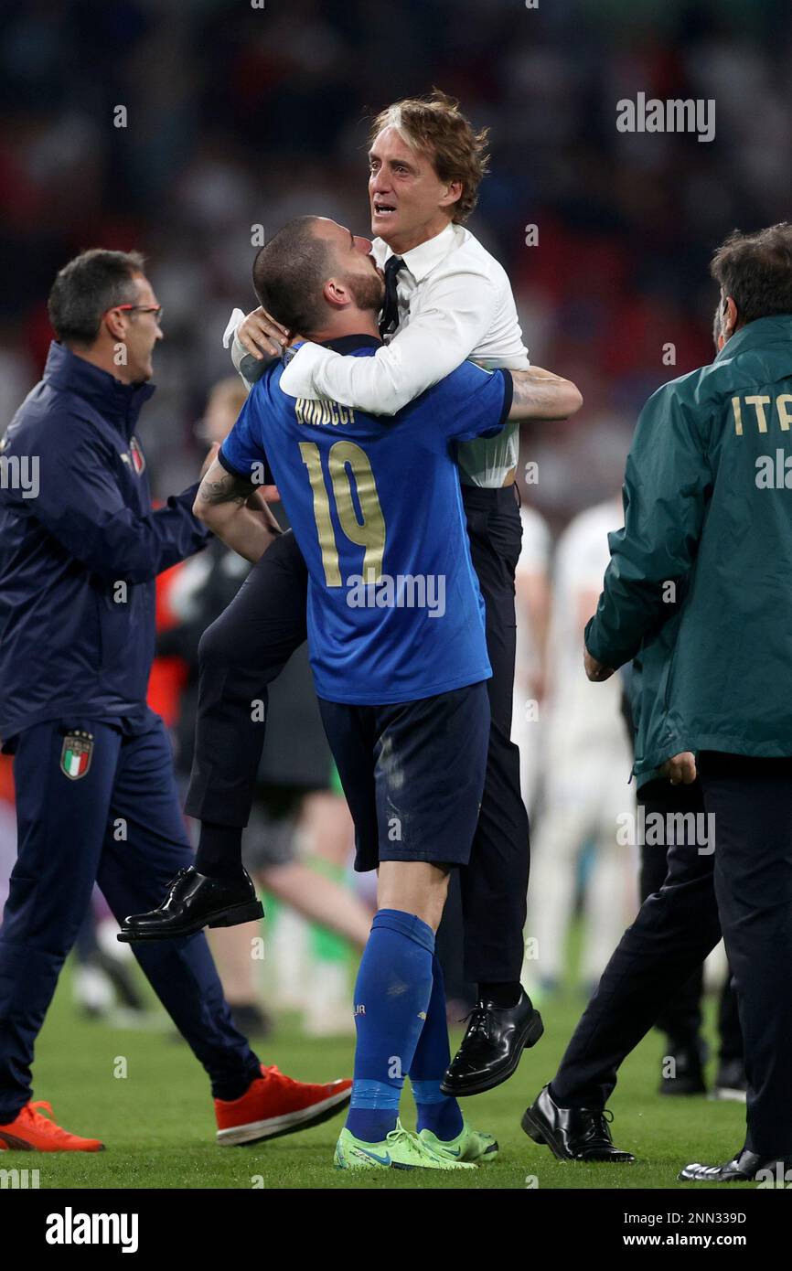 Italy's manager Roberto Mancini celebrates with Italy's Leonardo ...