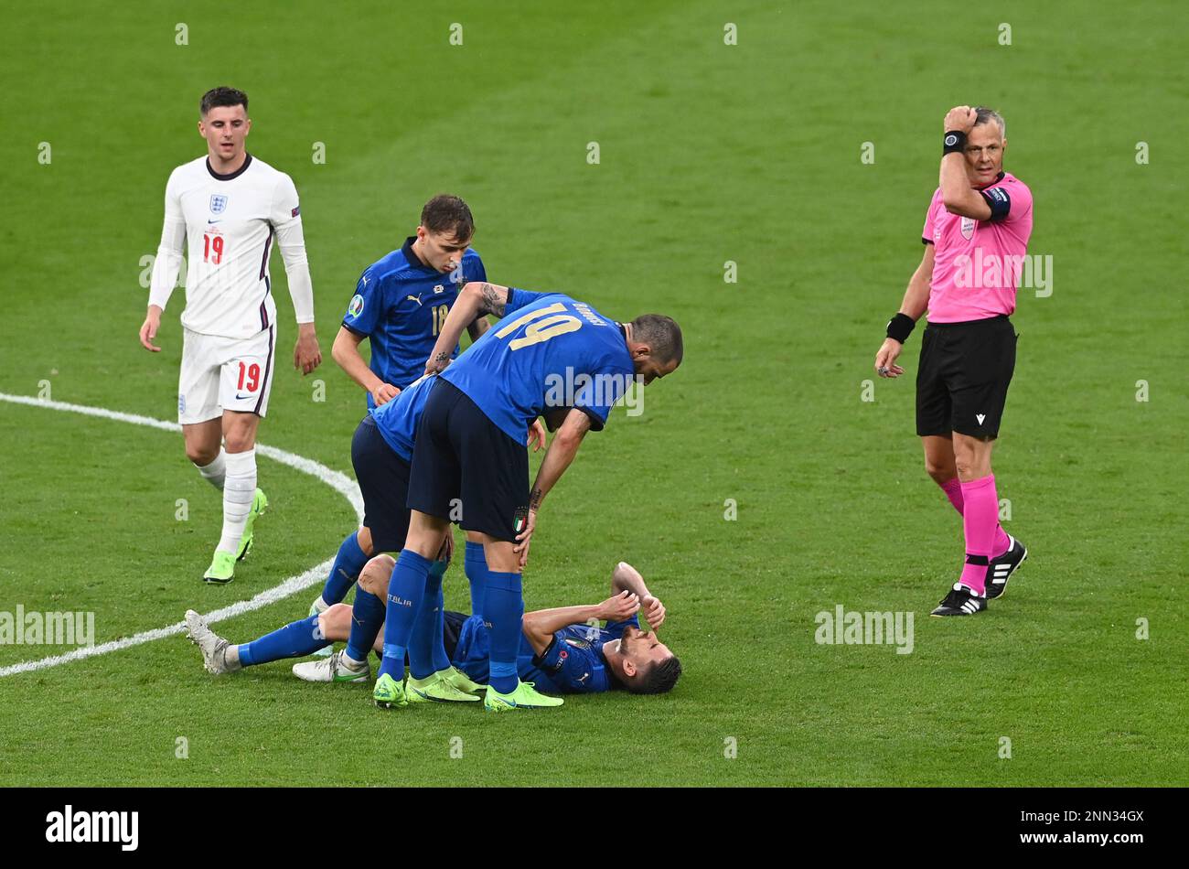 Italy's Jorginho reacts after sustaining an injury during the Euro 2020 ...
